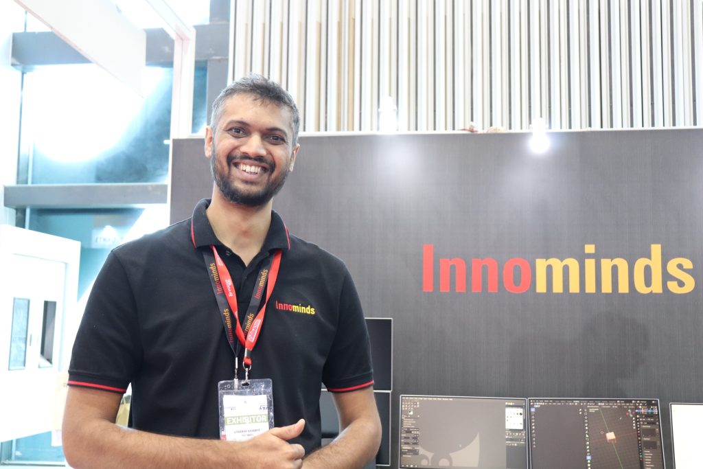 indian IT engineer smiling and laughing and being happy at an IoT Event ...